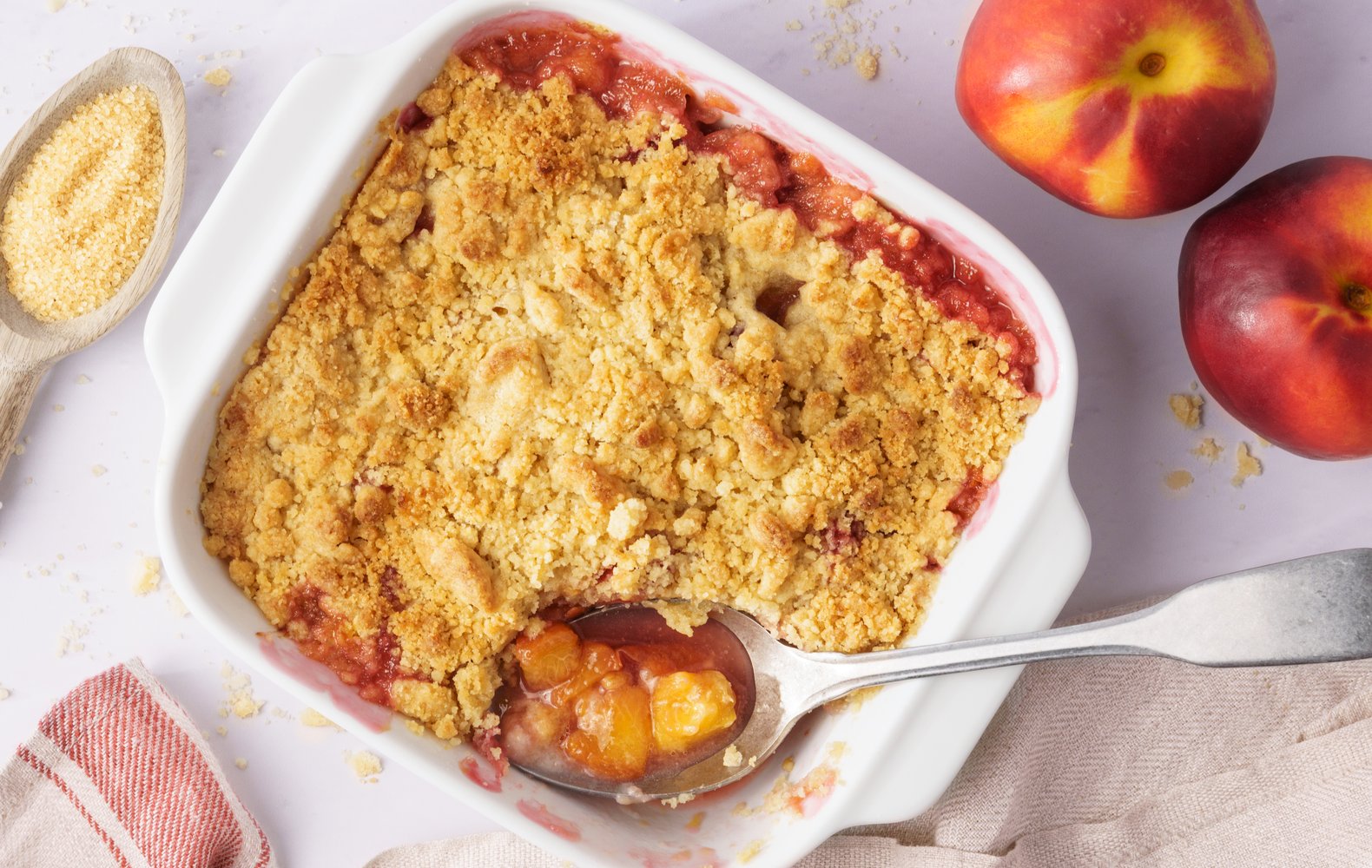 Ricetta Crumble di Pesche - Il Club delle Ricette